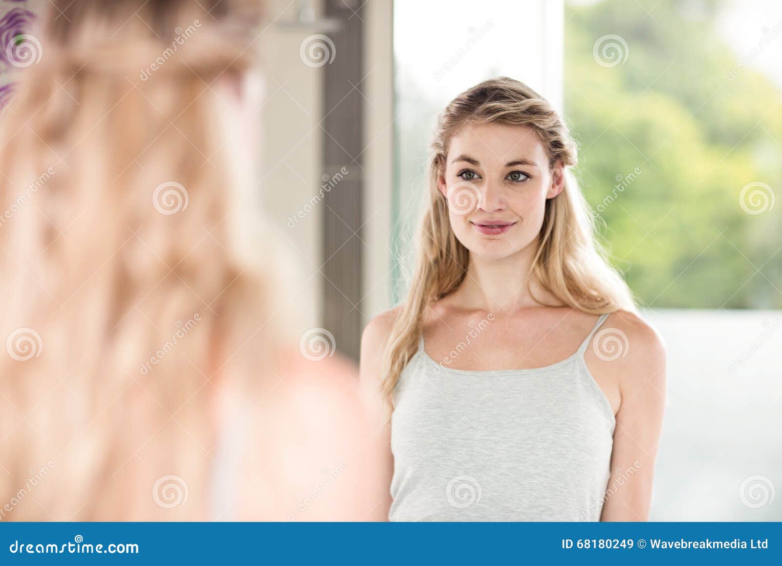 Confident Young Woman Looking in Mirror Stock Image - Image of beauty ...