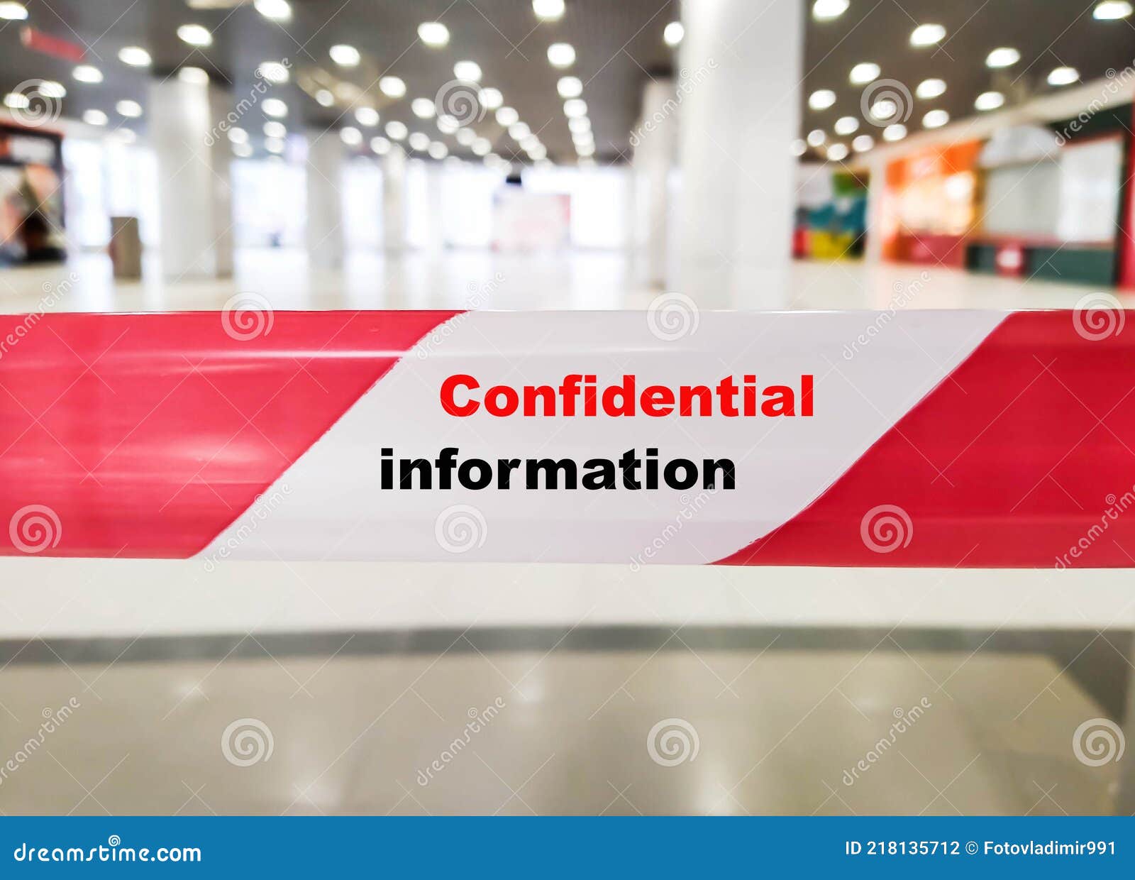 Confidential Information on Red Ribbon. Non-public Information Concept ...