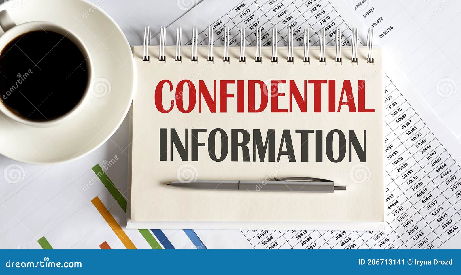 CONFIDENTIAL INFORMATION Text Written on a Notebook with Pen and Chart ...