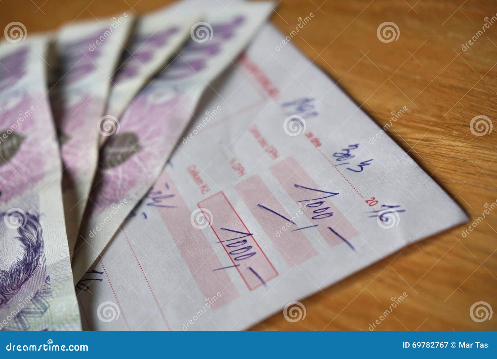Confirmation of a Payment (issue Slip) with the Blue Banknotes on the ...