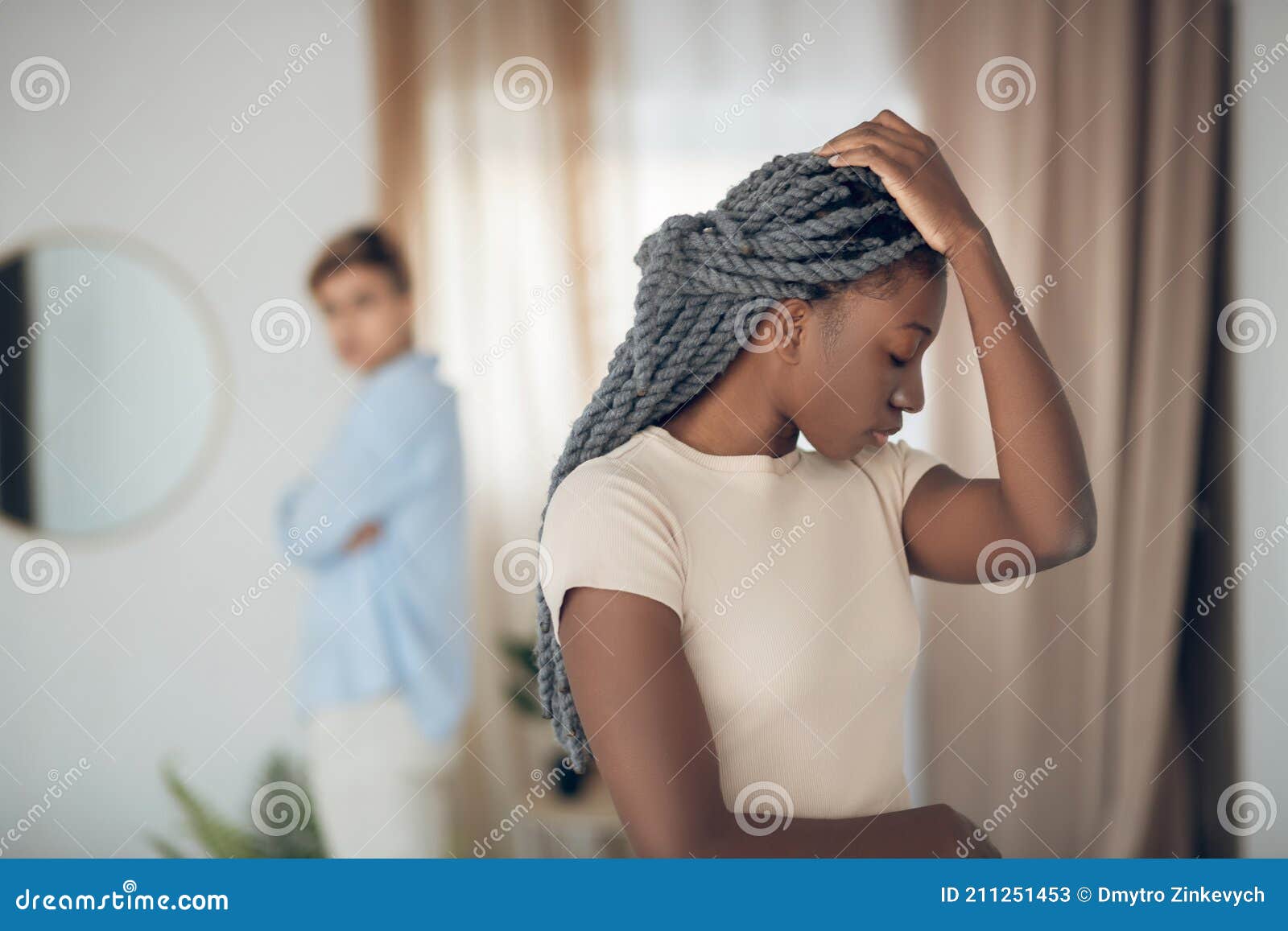 Same Sex Couple Having An Argument And Looking Frustrated Stock Image