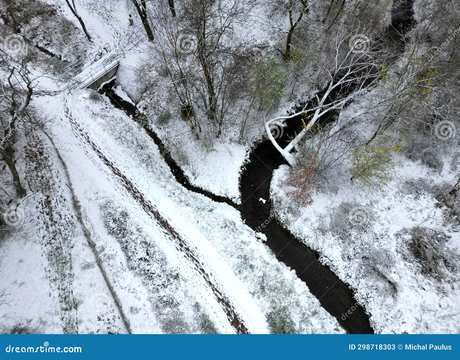 The Confluence of a Small Stream and a Larger River Across Which a ...