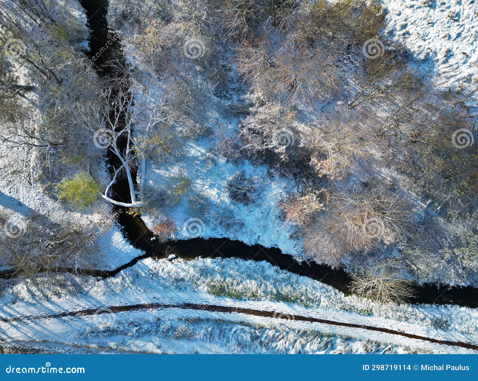 The Confluence of a Small Stream and a Larger River Across Which a ...