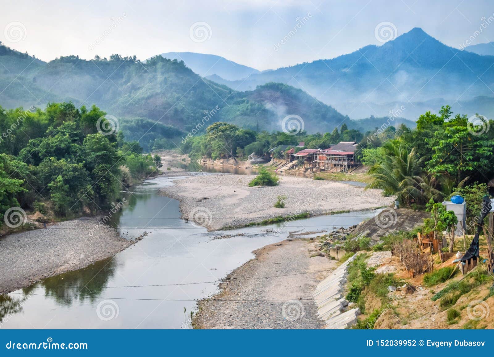 Confluence of Two Rivers in the Jungle and a House on the Shore Stock ...