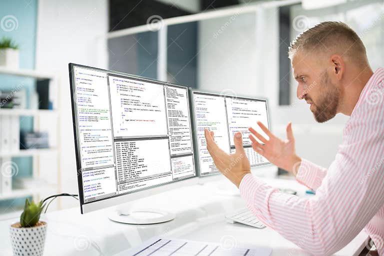 Confused Angry Programmer Using Computer Stock Photo - Image of debug ...