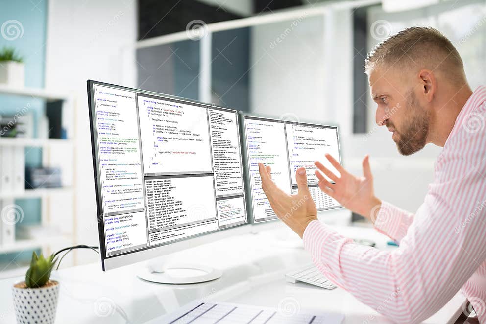 Confused Angry Programmer Using Computer Stock Photo - Image of debug ...