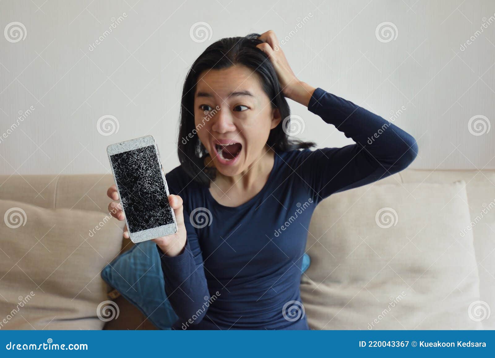 Confused Angry Woman Having Problem With Phone Sitting On Couch At Home ...