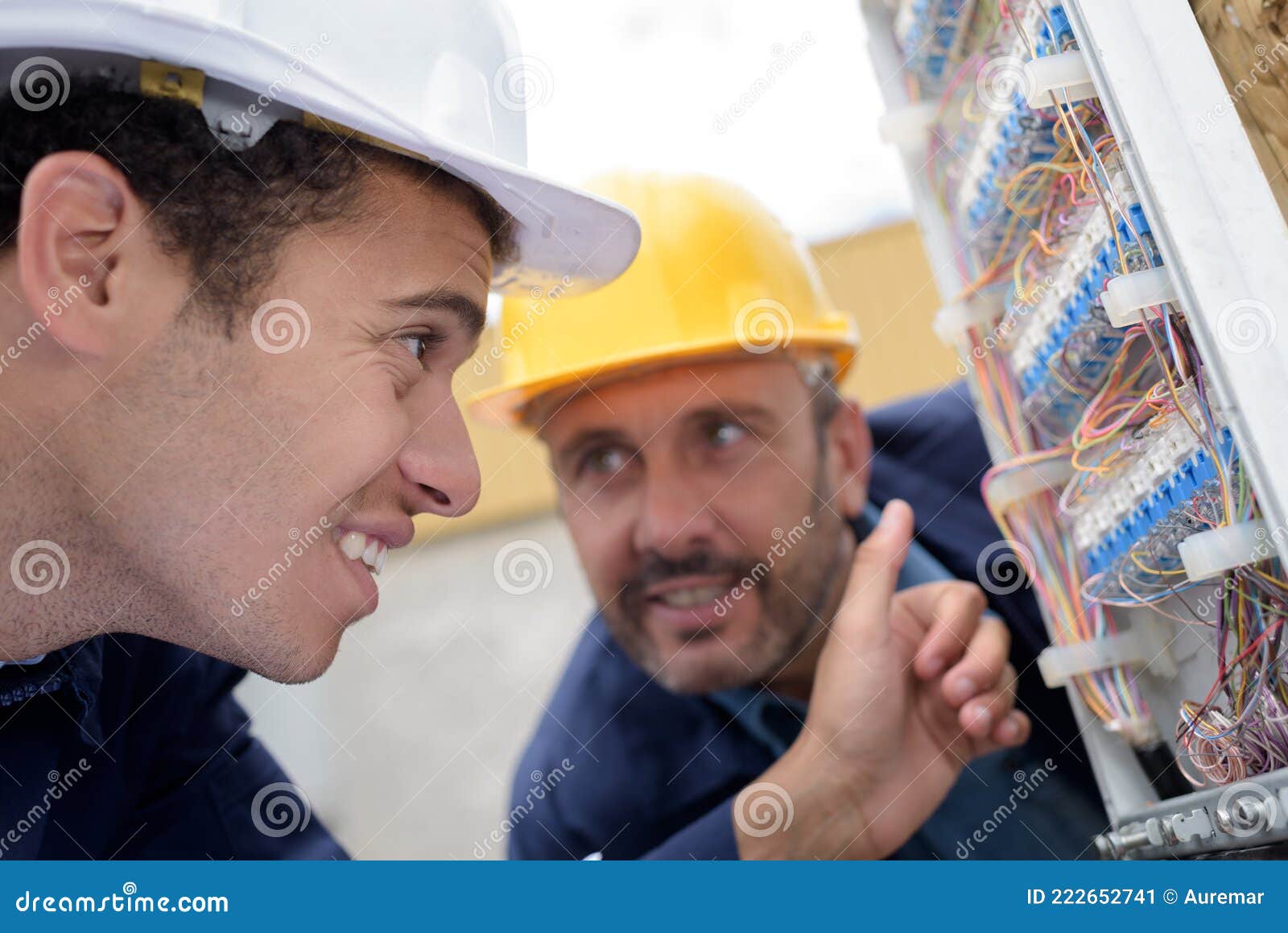 Confused Apprentice Electrician Looking At Fusebox Stock Image ...