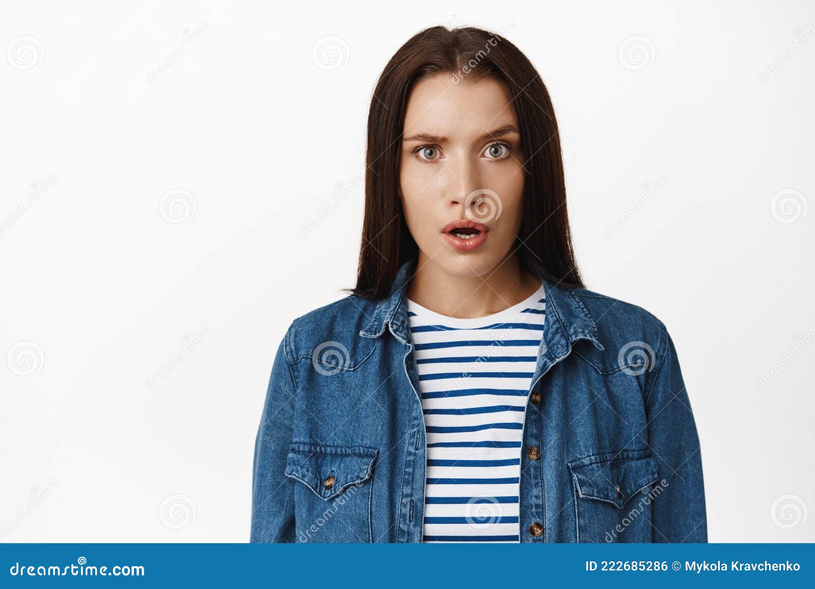 Confused Brunette Woman Raise Eyebrow and Stare Puzzled at Camera, Cant ... Confused Brunette Woman Raise Eyebrow and Stare Puzzled at Camera, Cant ...