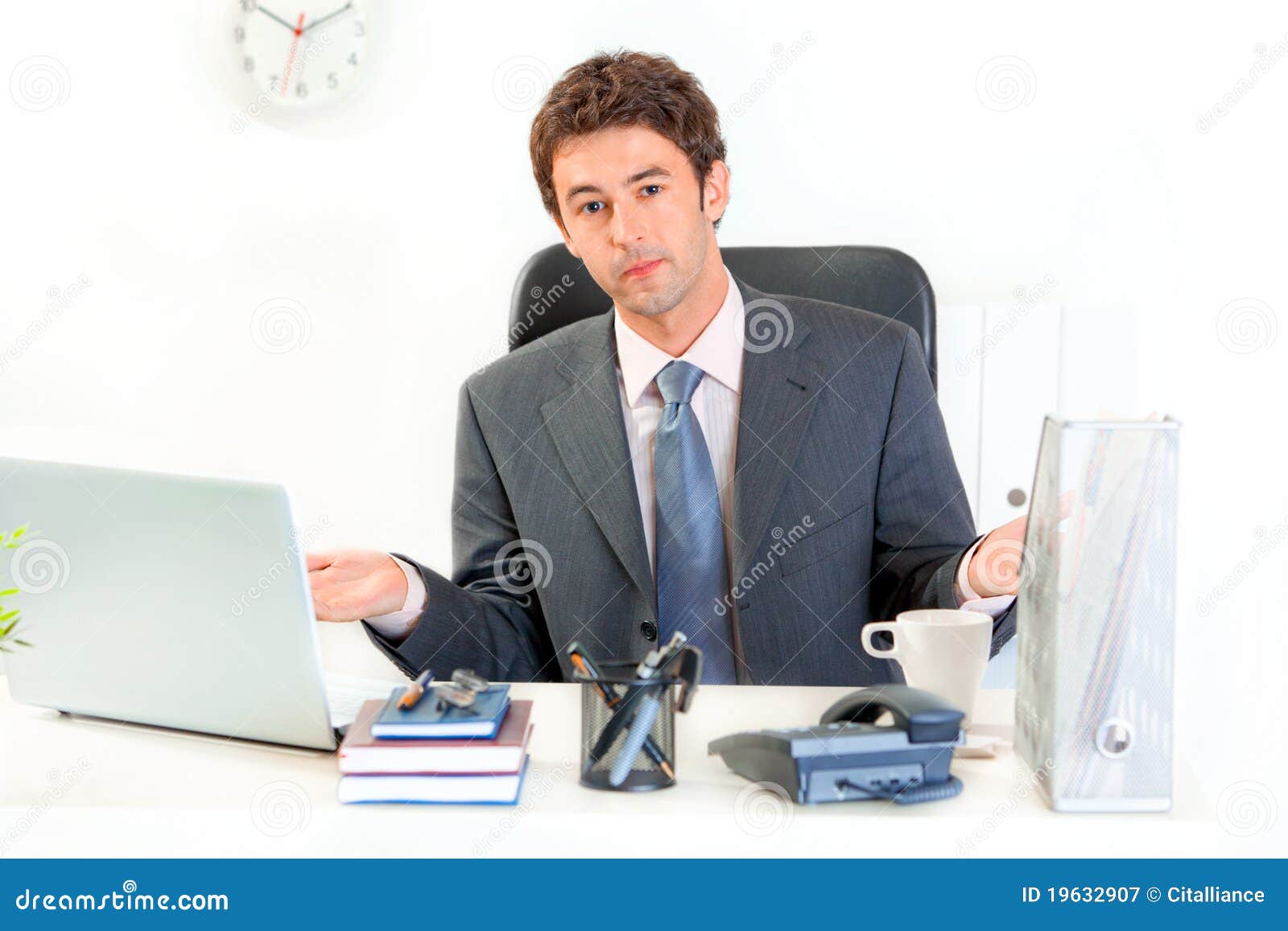 Confused Business Man Sitting at Office Desk Stock Image - Image of ... Confused Business Man Sitting at Office Desk Stock Image - Image of ...