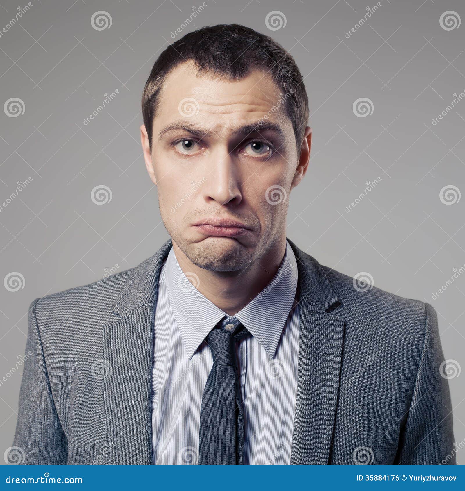 Confused Businessman on Gray Background Stock Photo - Image of crazy ...