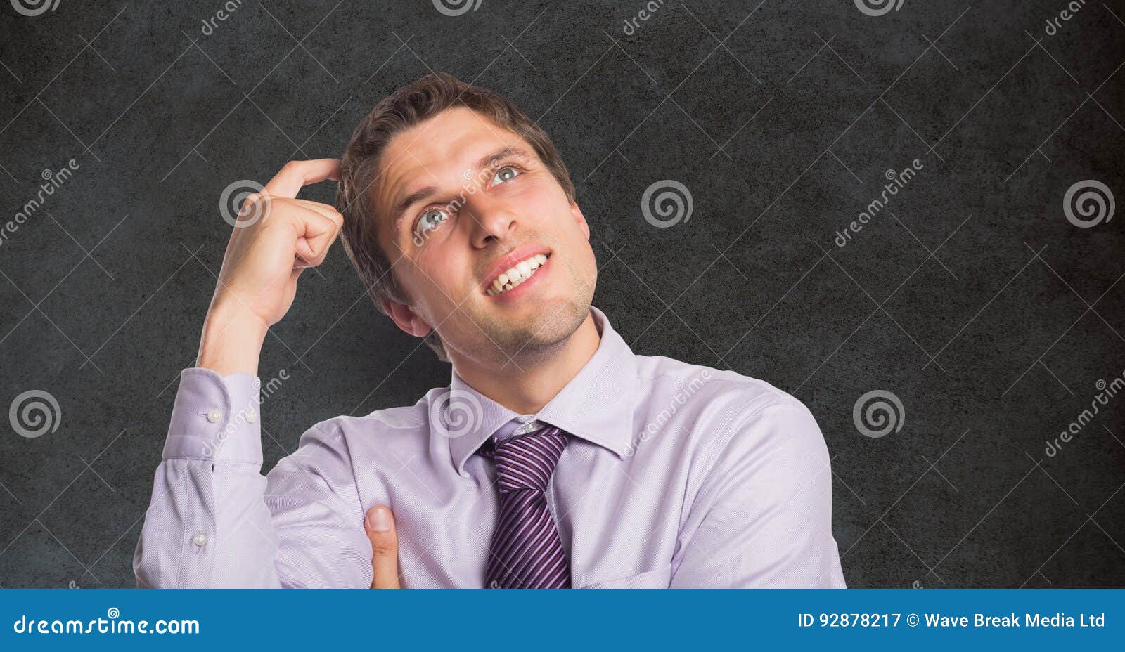 Confused Businessman Scratching Head Against Blackboard Stock Image ...