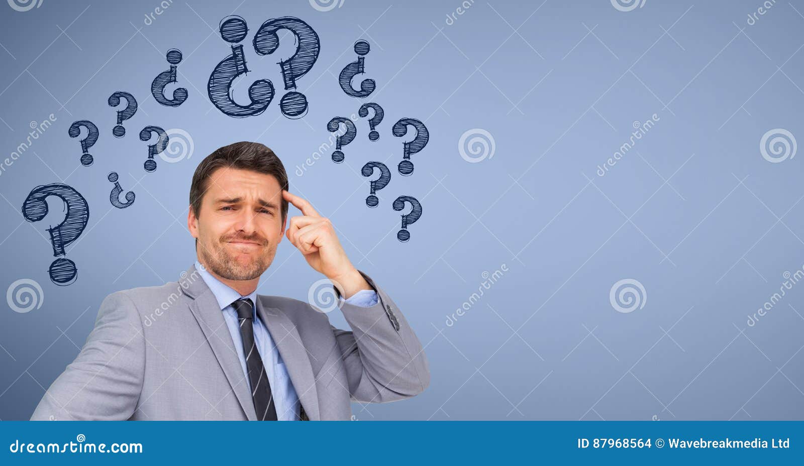 Confused Businessman Standing with Graphics Over Head Stock Photo ...