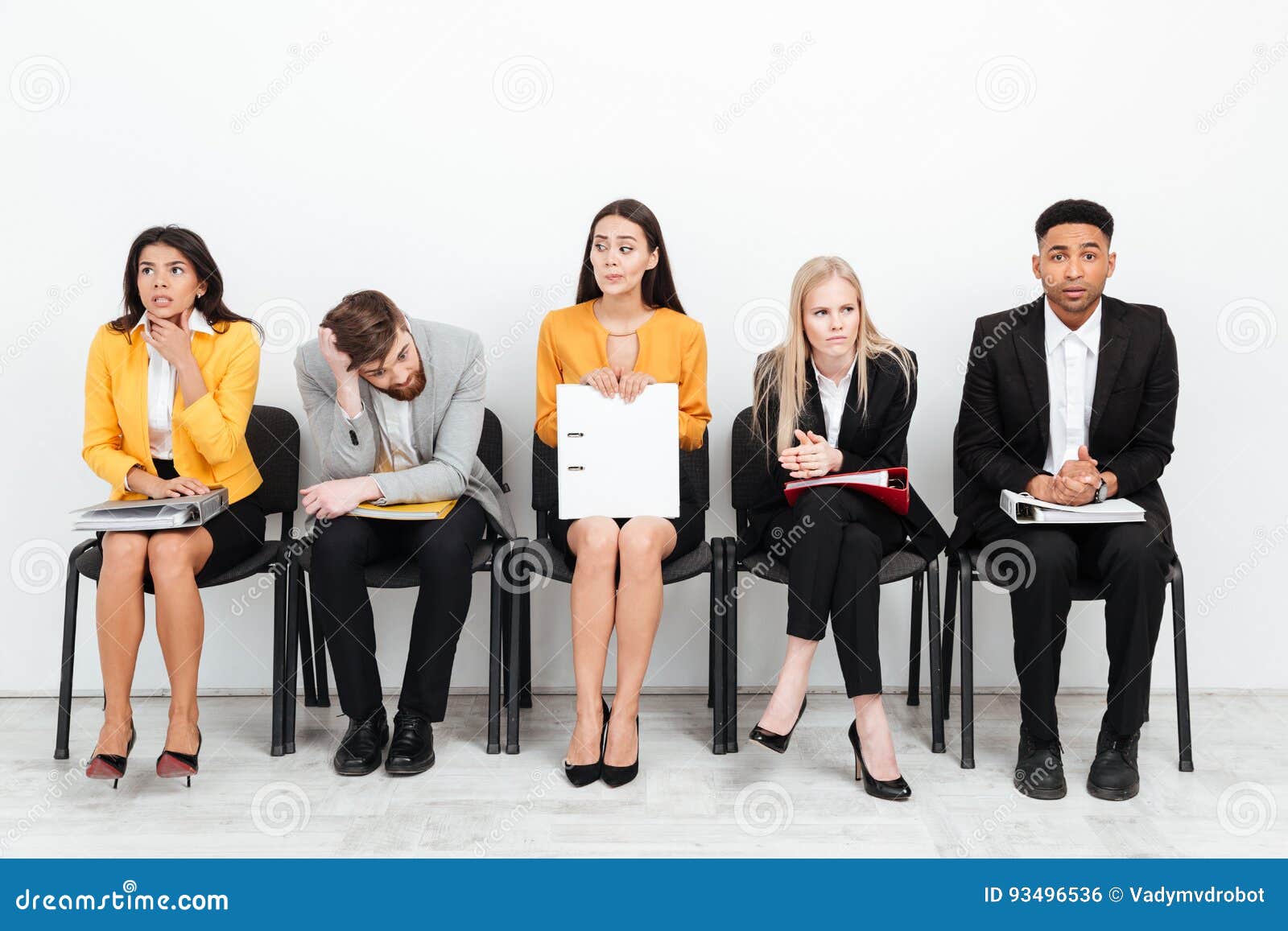 Confused Colleagues Sitting in Office. Stock Photo - Image of associate ...