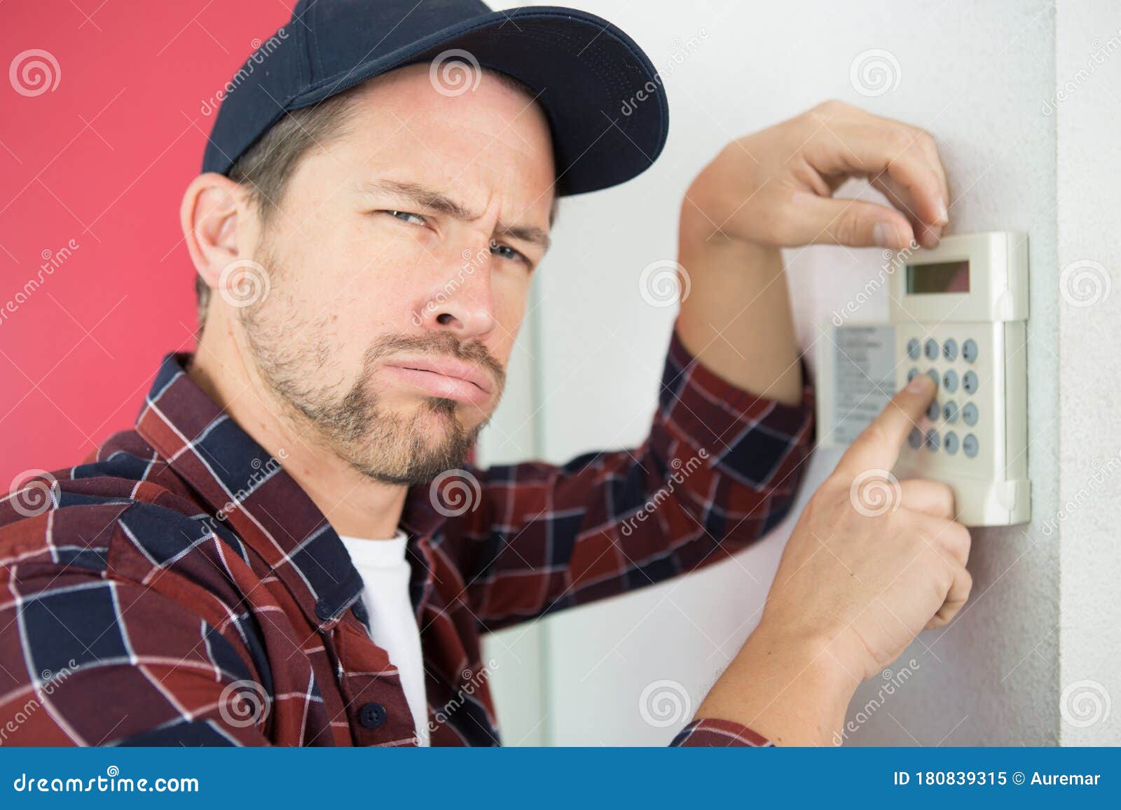 Confused Contractor Trying To Fathom Electronic Keypad Stock Image ...