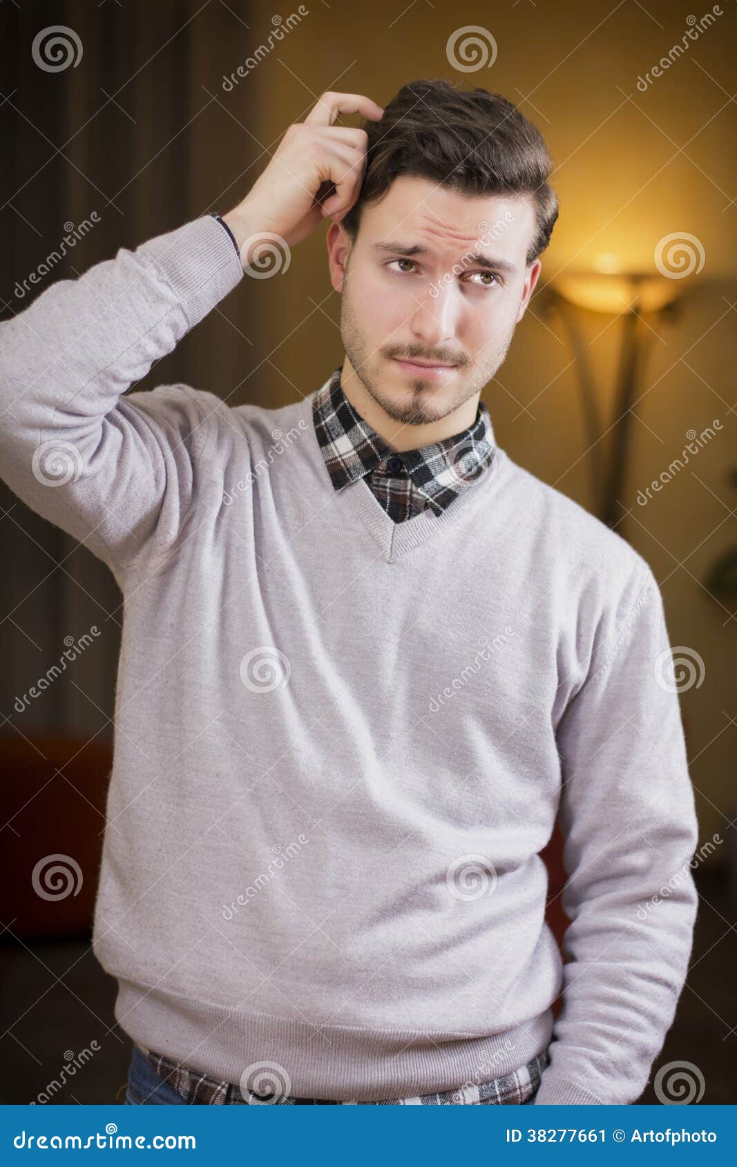 Confused or Doubtful Young Man Scratching His Head and Looking Up Stock ...