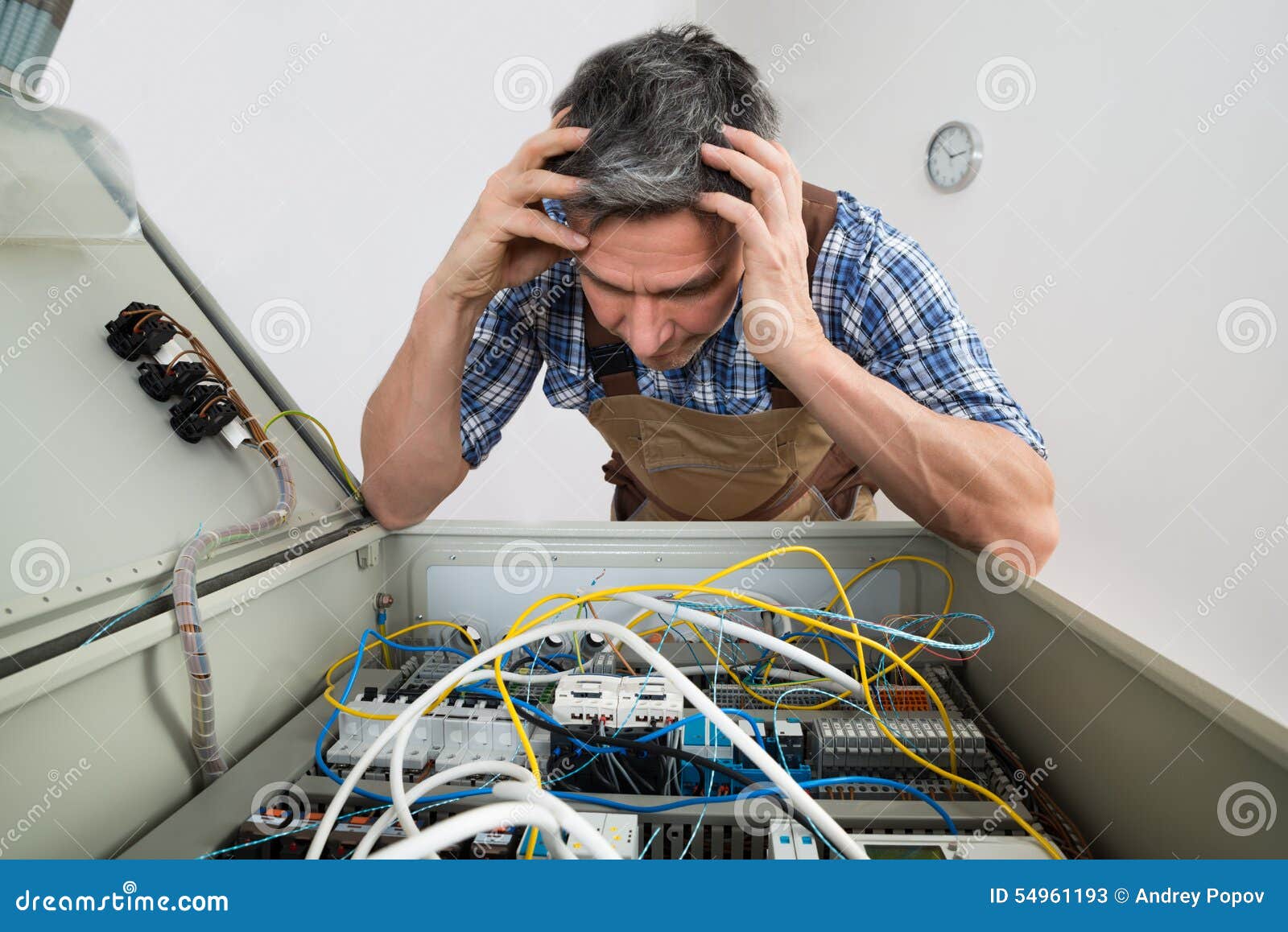 Confused Electrician Looking at Fuse Box Stock Image - Image of male ...