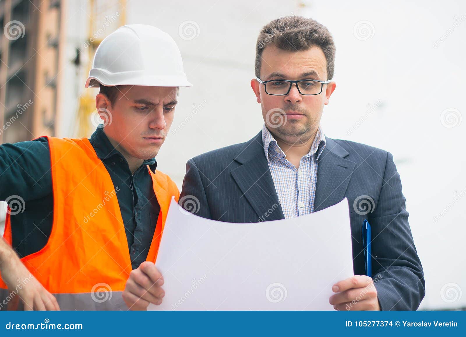 Confused Engineer with a Boss Working on Architectural Plan, Sketching ...