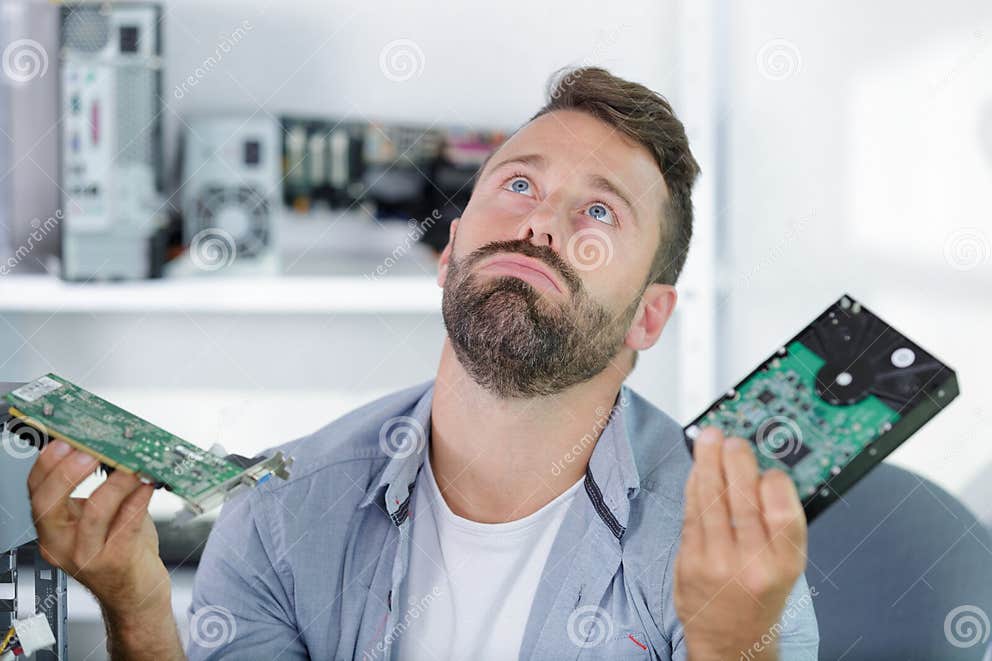 Confused Engineer Working in Office Stock Photo - Image of engineering ...