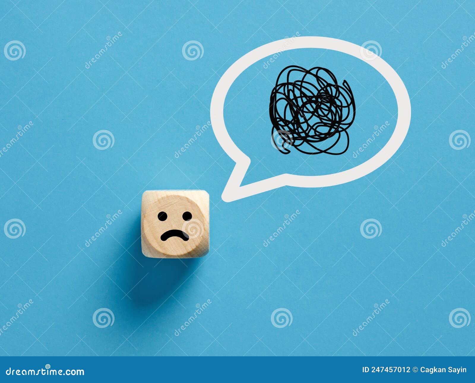 Confused Face Icon on a Wooden Cube with Confusion Symbol in a Speech ...