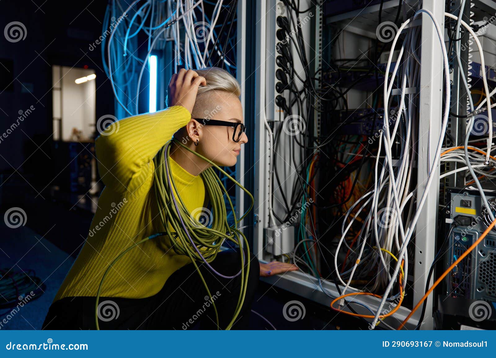 Confused Female Data Center Technician Inspecting Computer System and ...