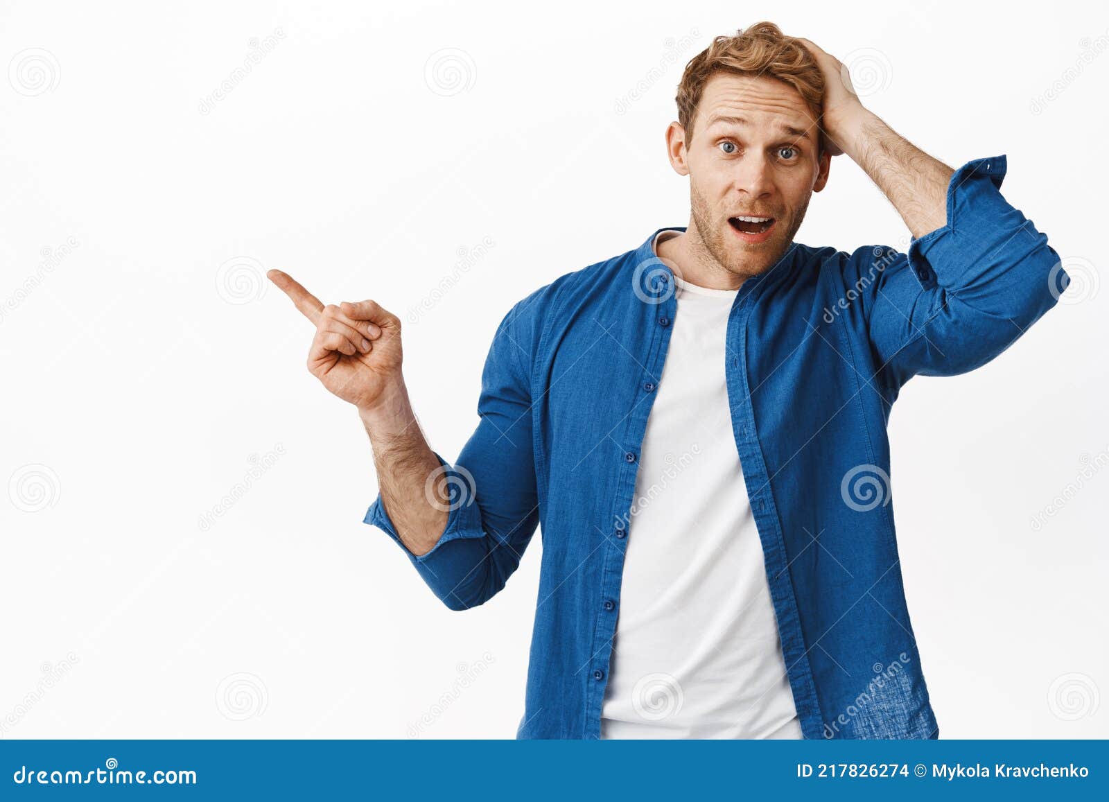 Confused Guy Scratch Head and Pointing Left at Something Surprising ...