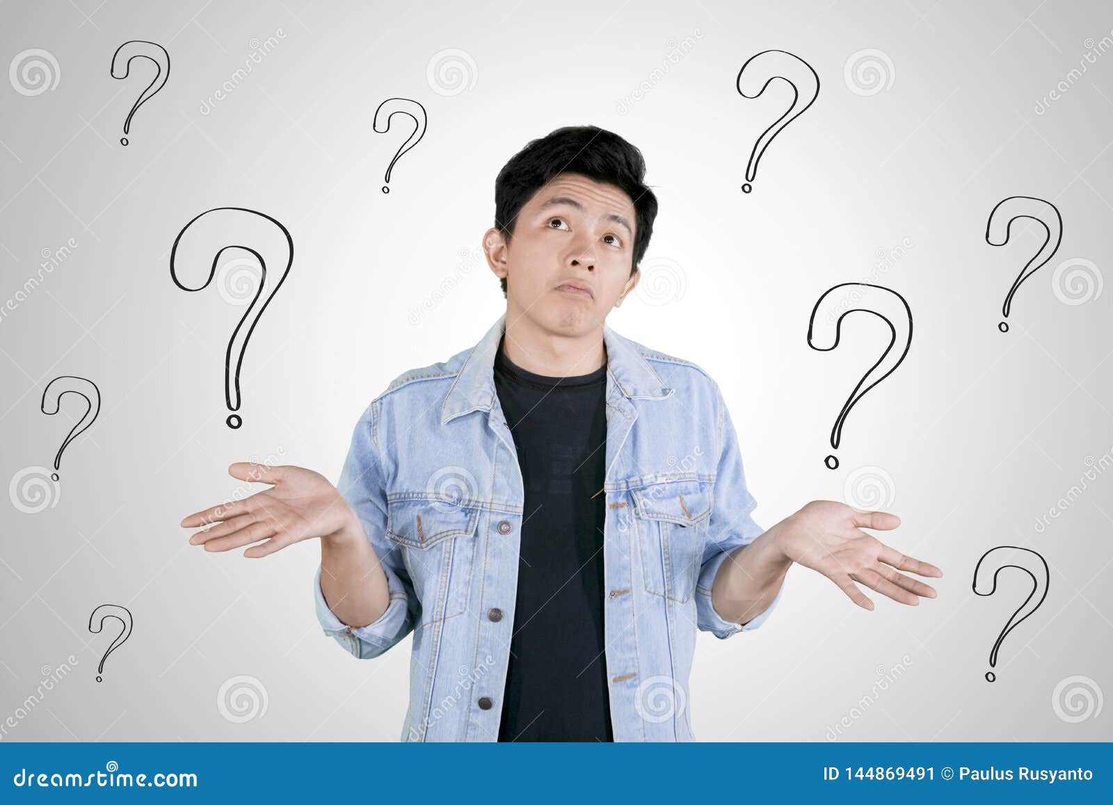 Confused Handsome Man with Question Marks Stock Image - Image of ...