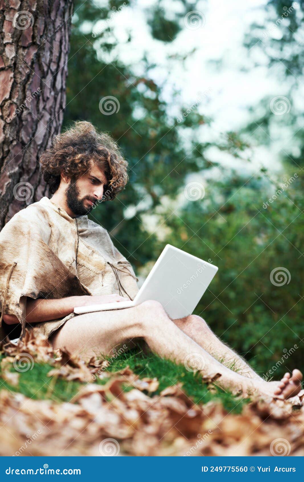 What Scorcery is this. a Confused Looking Caveman Sitting by a Tree ...