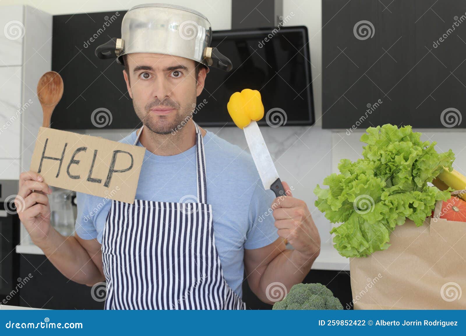 Confused Man Asking for Help in the Kitchen Stock Photo - Image of ...