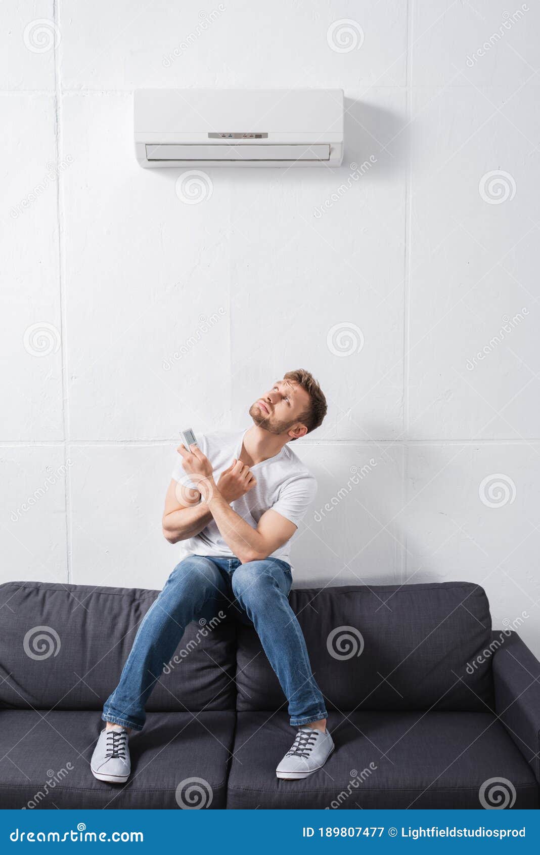 Confused Man Holding Remote Controller and Stock Image - Image of ...