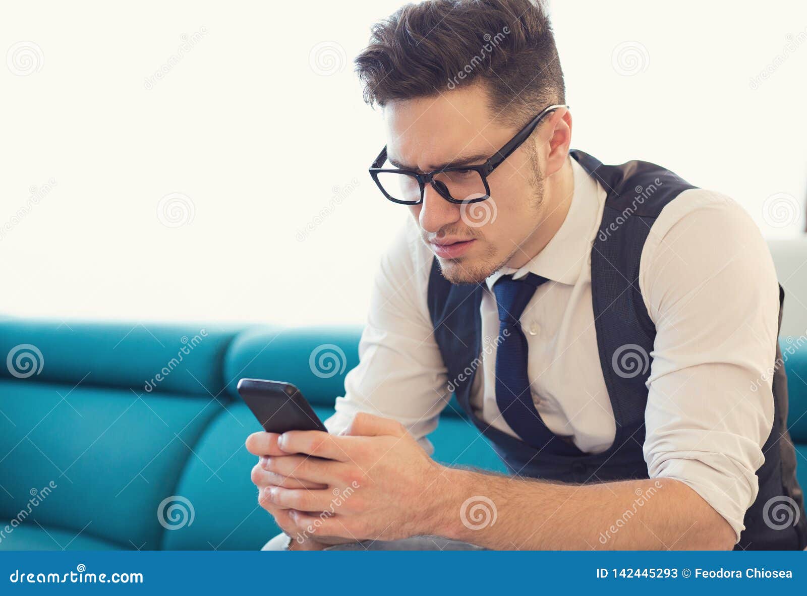 Confused Man Reading Message On Smartphone Stock Image Image Of
