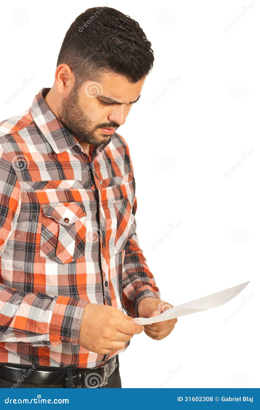 Confused man reading paper stock photo. Image of paper - 31602308