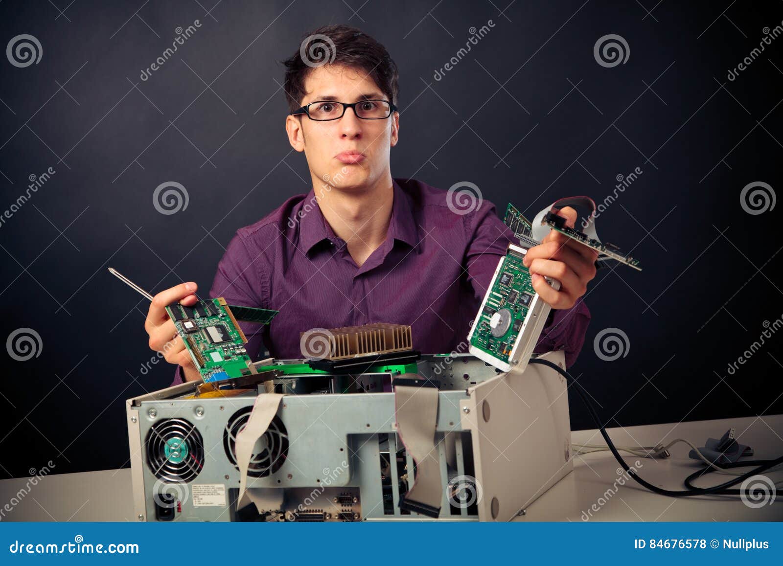 Confused Nerd with Lots of Hardware Stock Photo - Image of building ...