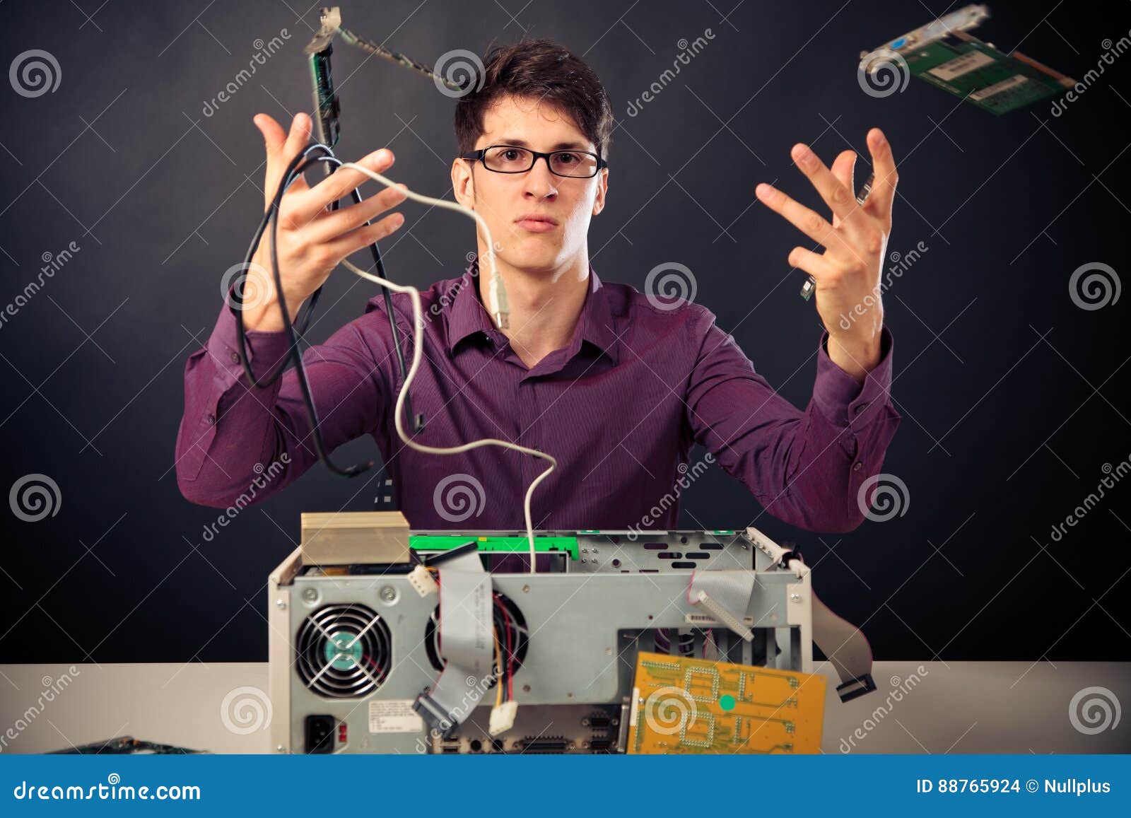Confused Nerd with Lots of Hardware Stock Photo - Image of professional ...