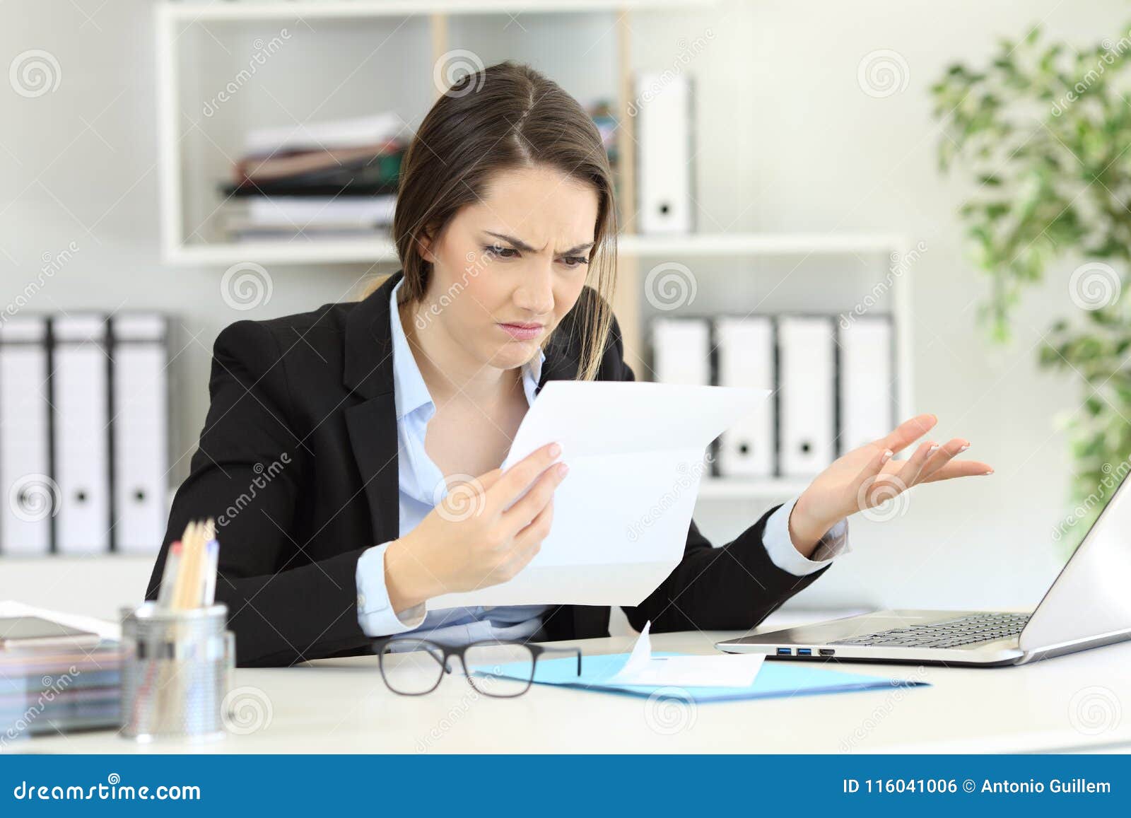 Confused Office Worker Reading Documents Stock Photo - Image of doubt ...