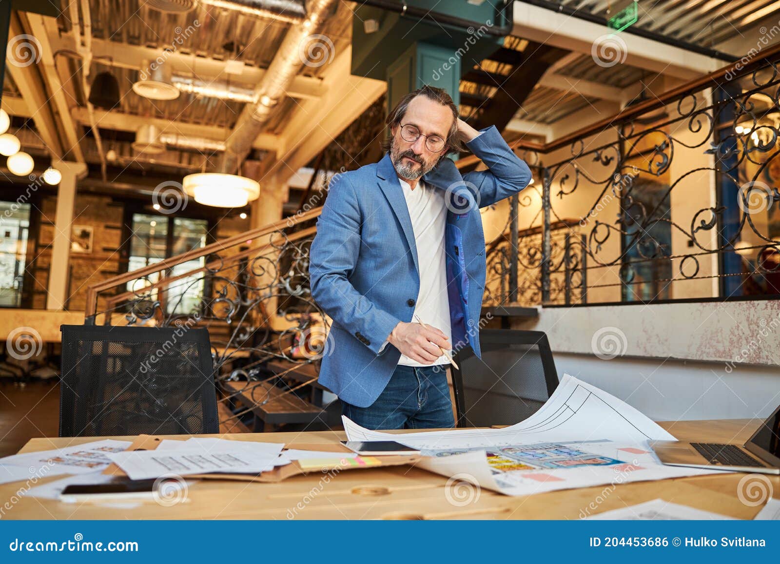 Confused Office Worker Thinking of Ways To Resolve a Task Stock Photo ...