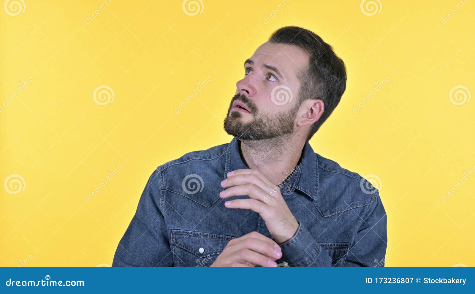 The Confused Scared Young Man Looking Side Ways, Yellow Background ...