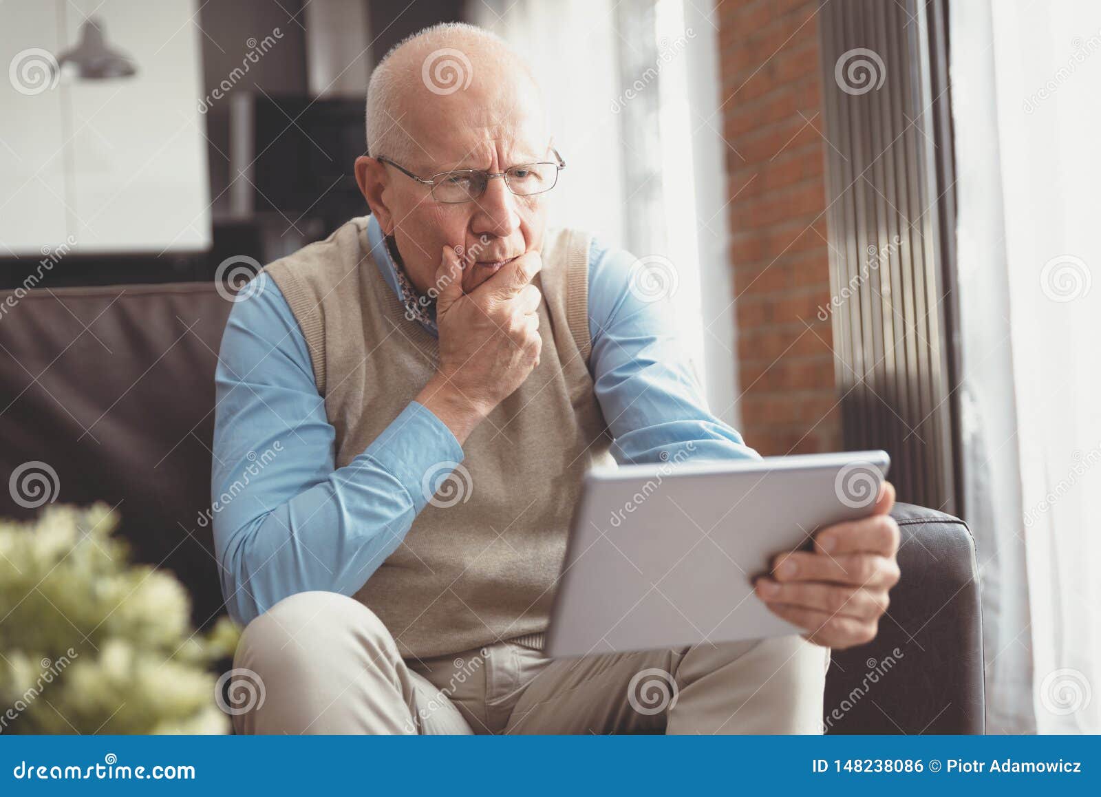 Confused Senior Man Using a Digital Tablet Stock Photo - Image of ... Confused Senior Man Using a Digital Tablet Stock Photo - Image of ...