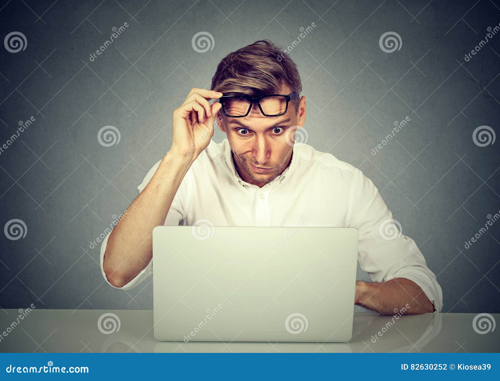 Confused Shocked Man Looking at His Laptop Stock Photo - Image of ...