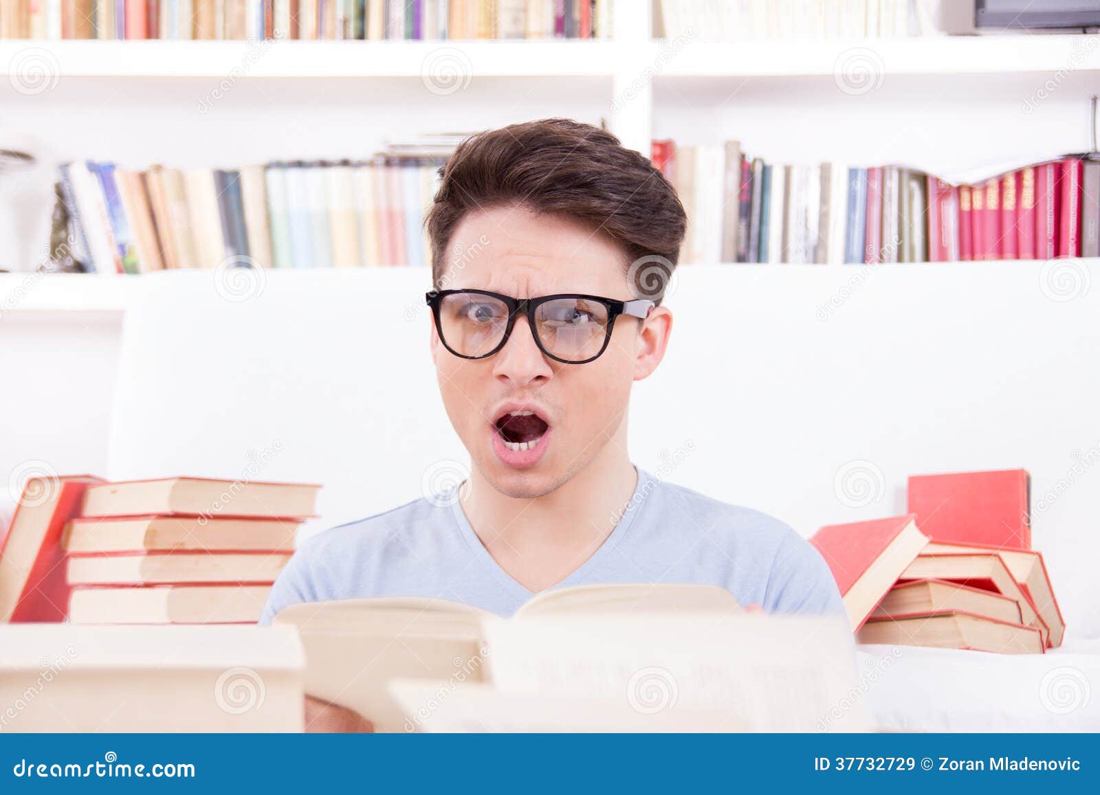 Confused Student with Glasses Surrounded by Books Stock Image - Image ...
