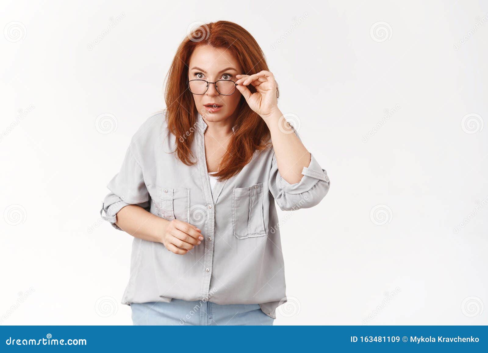 Confused Stunned Speechless Redhead Middle Aged Woman Taking Off