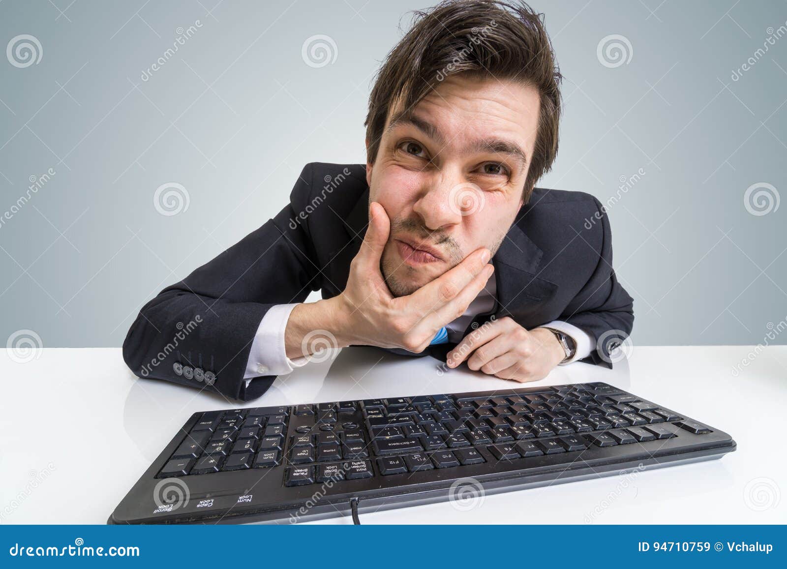 Confused or Suspicious Businessman is Working with Computer Stock Image ...