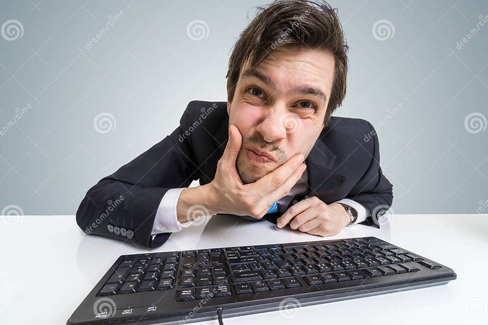 Confused or Suspicious Businessman is Working with Computer Stock Image ...