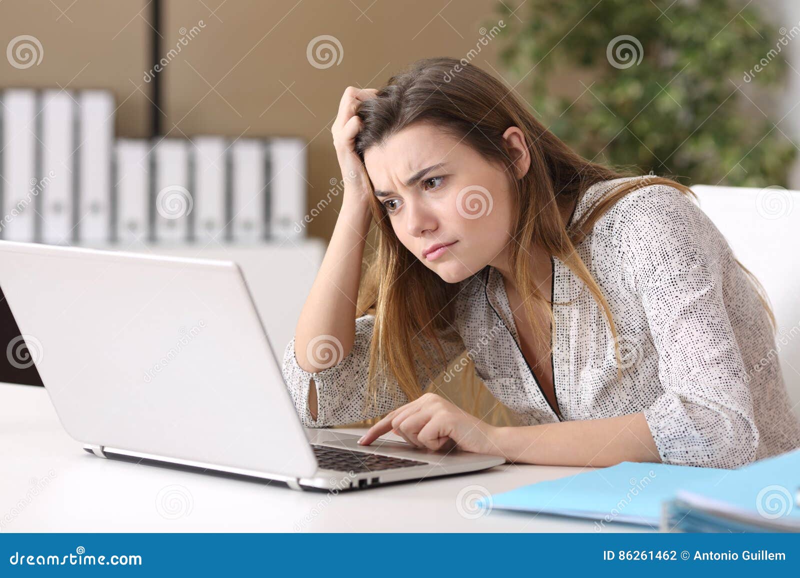 Confused Trainee Working in a Difficult Assignment Stock Photo - Image ...