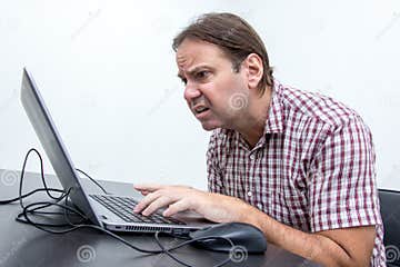 The Confused Unhappy User is Looking at the Computer Stock Photo ...
