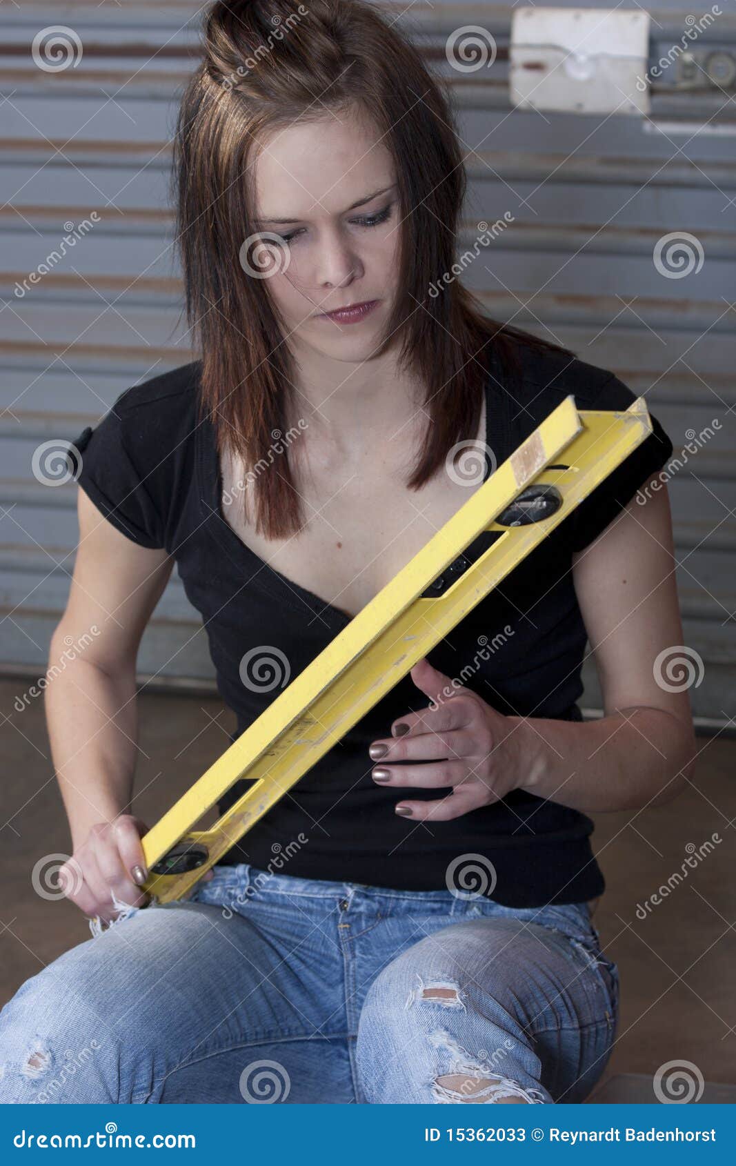 Confused woman with level stock image. Image of blue - 15362033