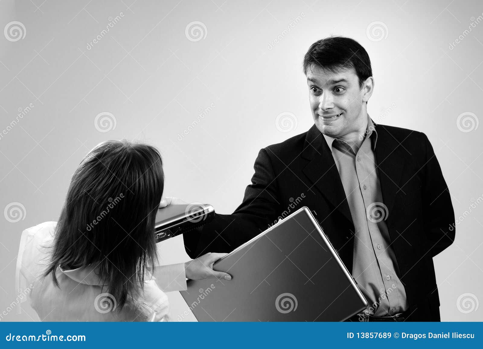 Confused Woman and Man Fighting with Notebooks Stock Image - Image of ...