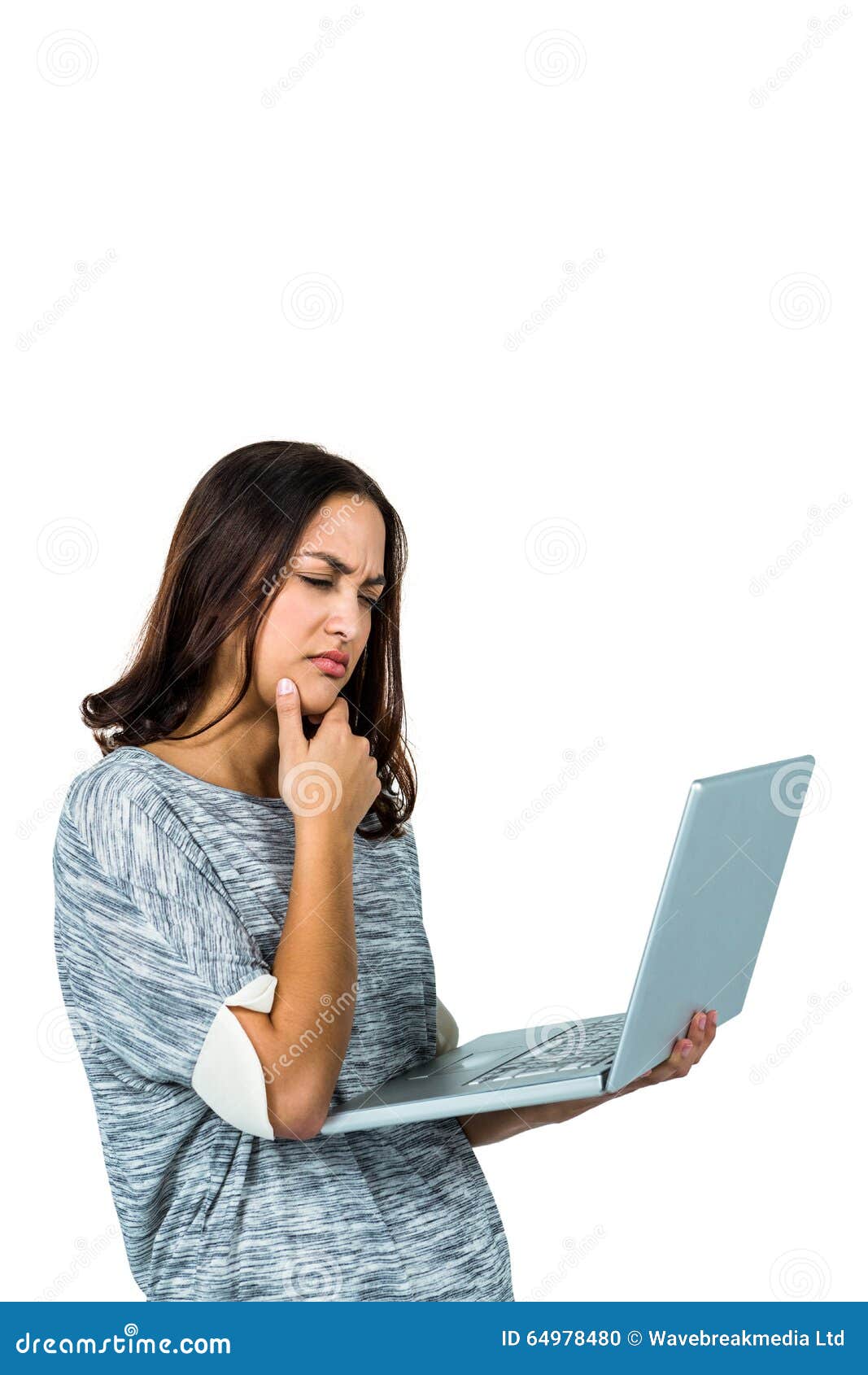Confused Woman Using Laptop Stock Photo - Image of holding, notebook ...
