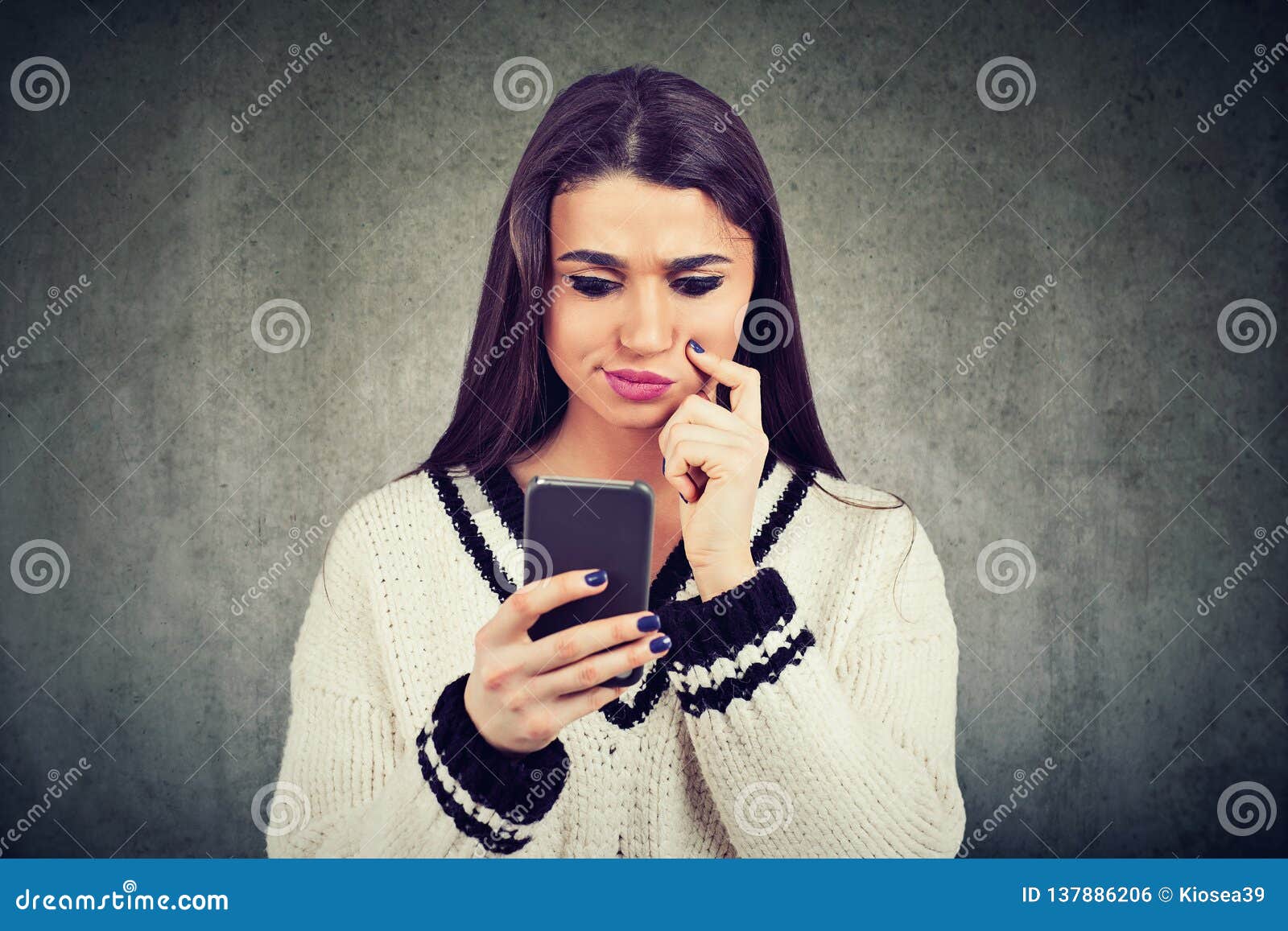 Confused Woman Using Mobile Phone Stock Photo - Image of fake, ethnic ...