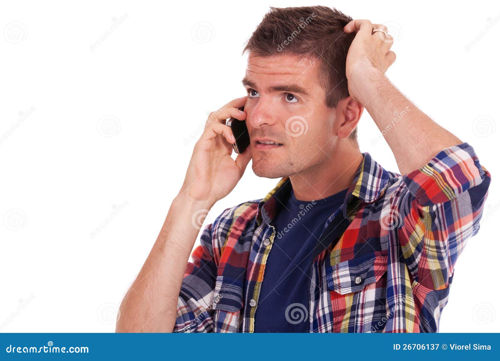 Confused Young Man On The Phone Royalty Free Stock Photography - Image ...